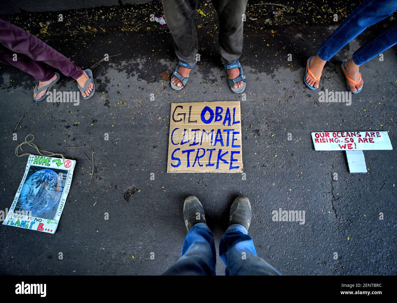 Climate Justice placards lie on the ground as a part of the Climate ...