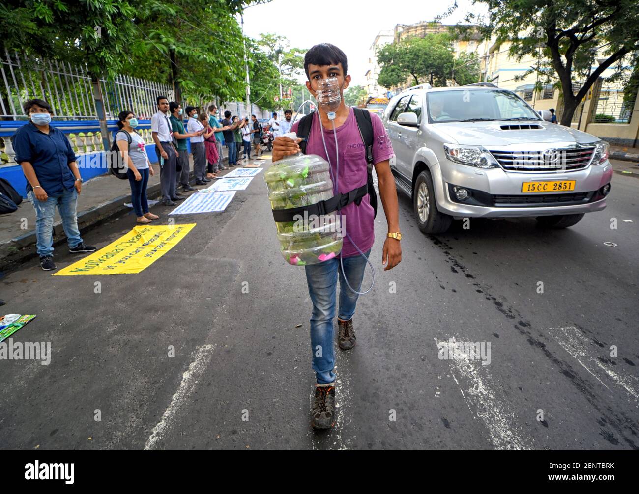 An activist demonstrates of environmental pollution during the Global ...