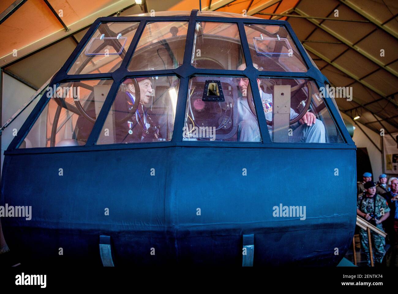 Prince Charles sits in the cockpit of a replication slider and poses ...