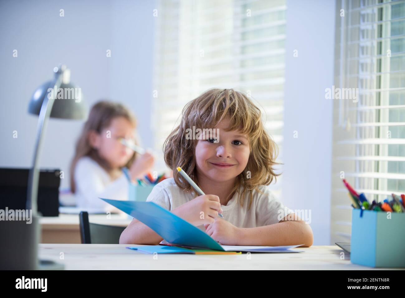 Happy schoolboy in classroom. Education and learning Stock Photo - Alamy