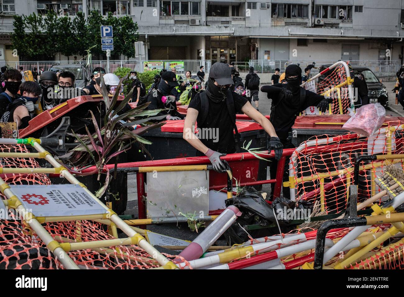 Demonstrators make barricades in Tuen Mun Park during the protests ...