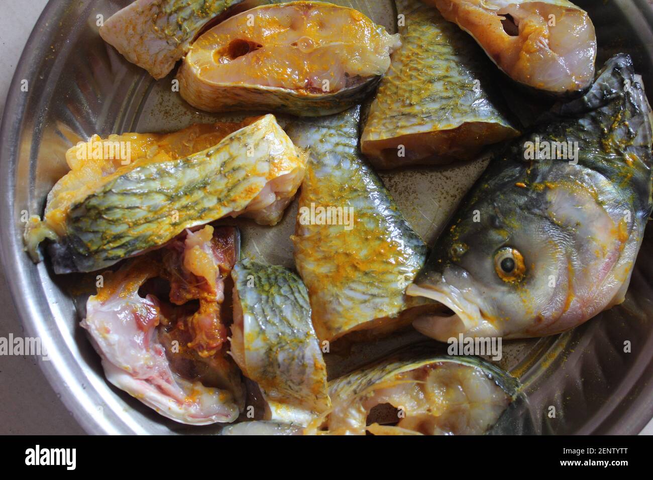 fish cut into pieces fish steak cutting Stock Photo - Alamy