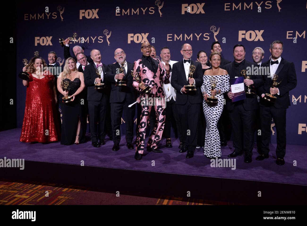 RuPaul and the team behind RuPaul's Drag Race poses in the press room ...