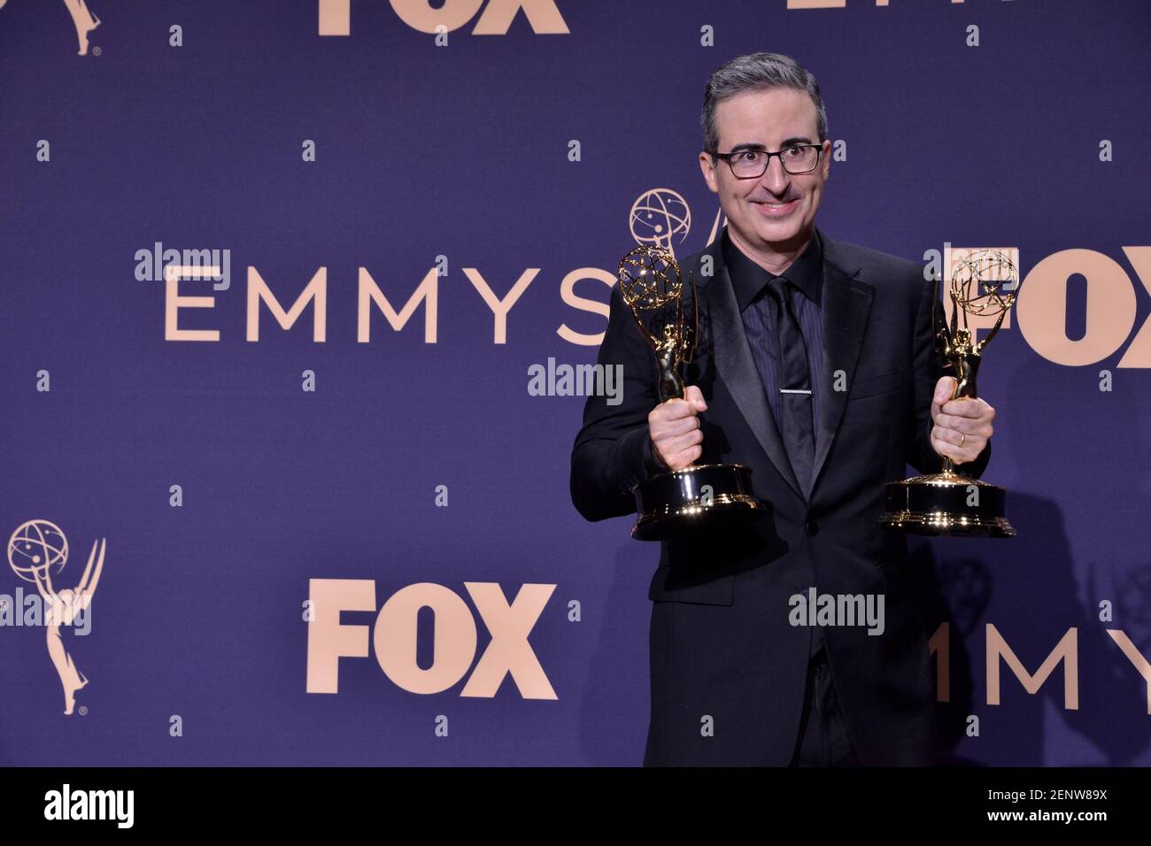 John Oliver poses in the press room at the 71st Primetime Emmy Awards ...