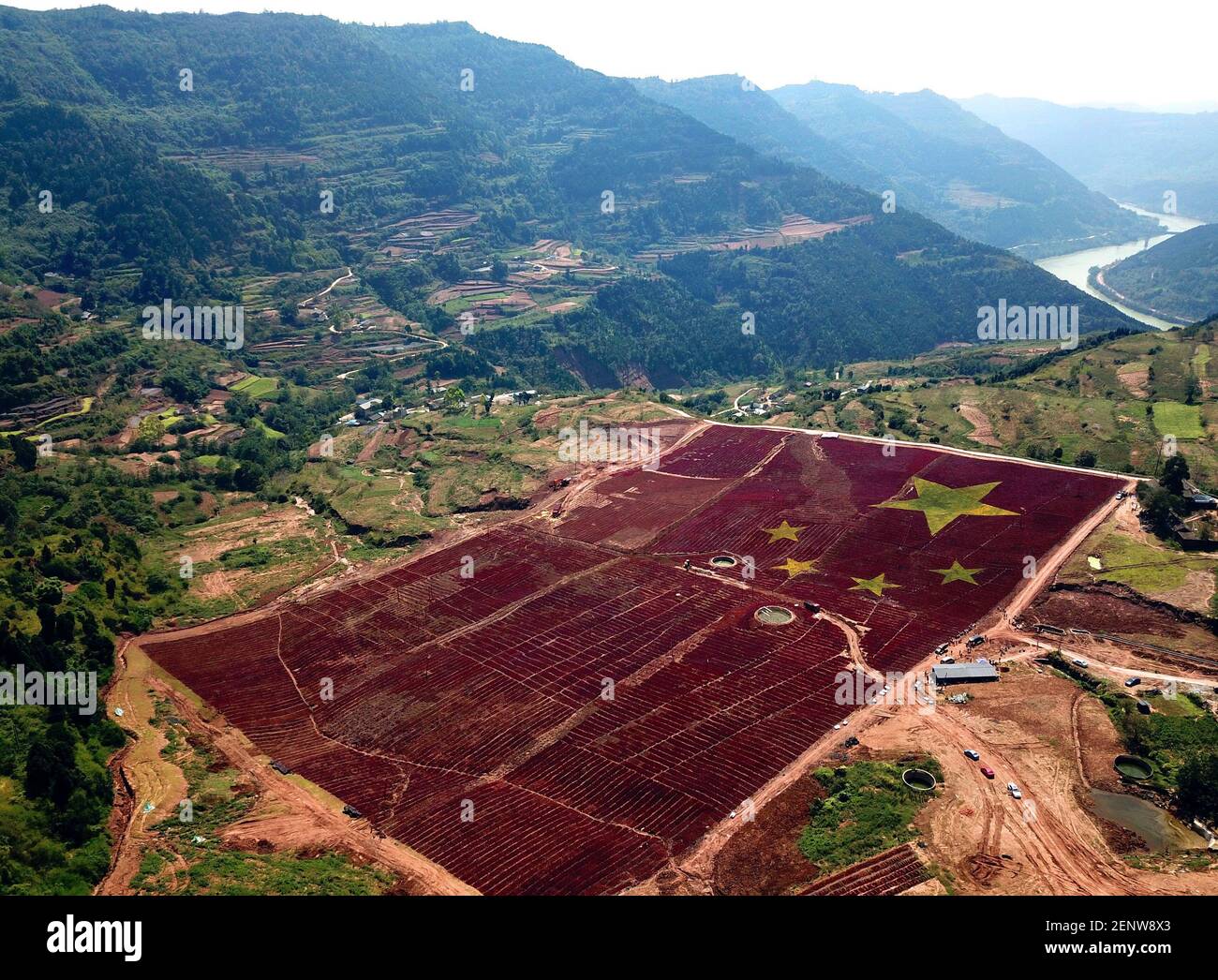 An aerial view of the large national flag of 125 acres compsed by ...