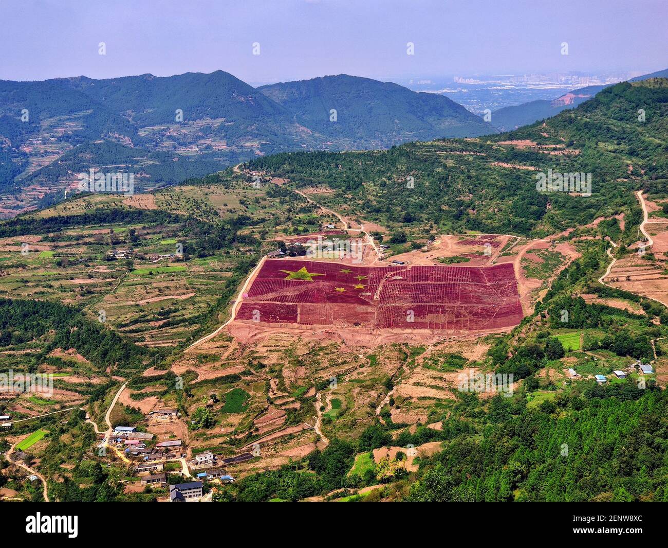 An aerial view of the large national flag of 125 acres compsed by ...