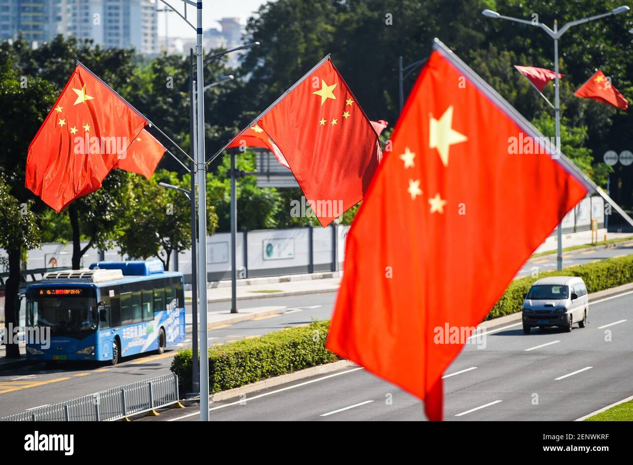 Red Chinese flags set up on a main road to embrace the 70th anniversary ...