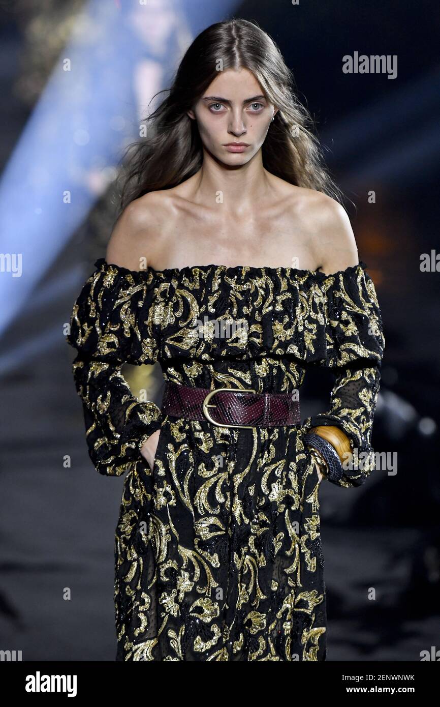 Model walking on the runway during the Yves Saint Laurent Ready to Wear ...