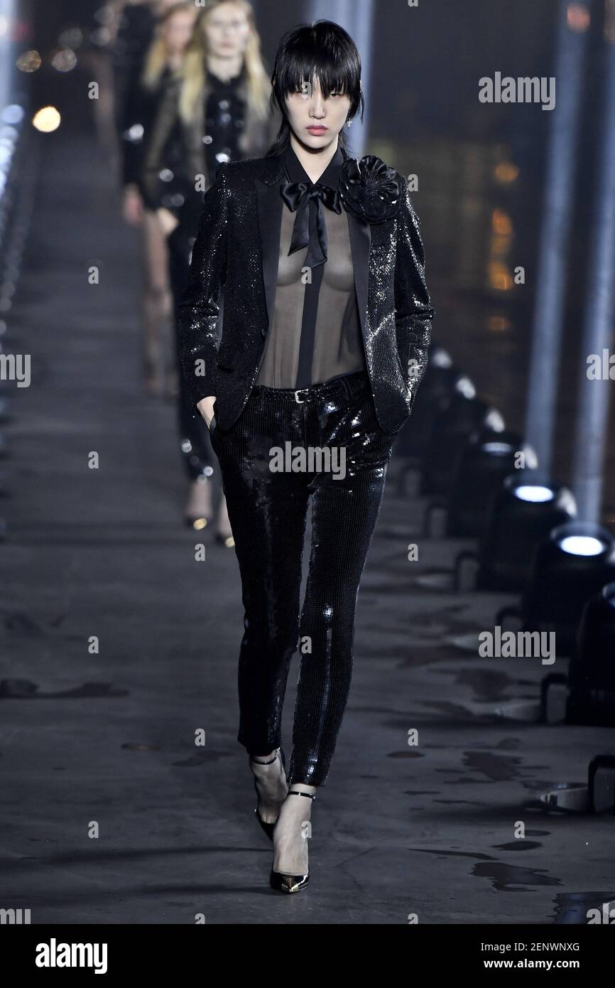 Model Sora Choi walking on the runway during the Yves Saint Laurent ...