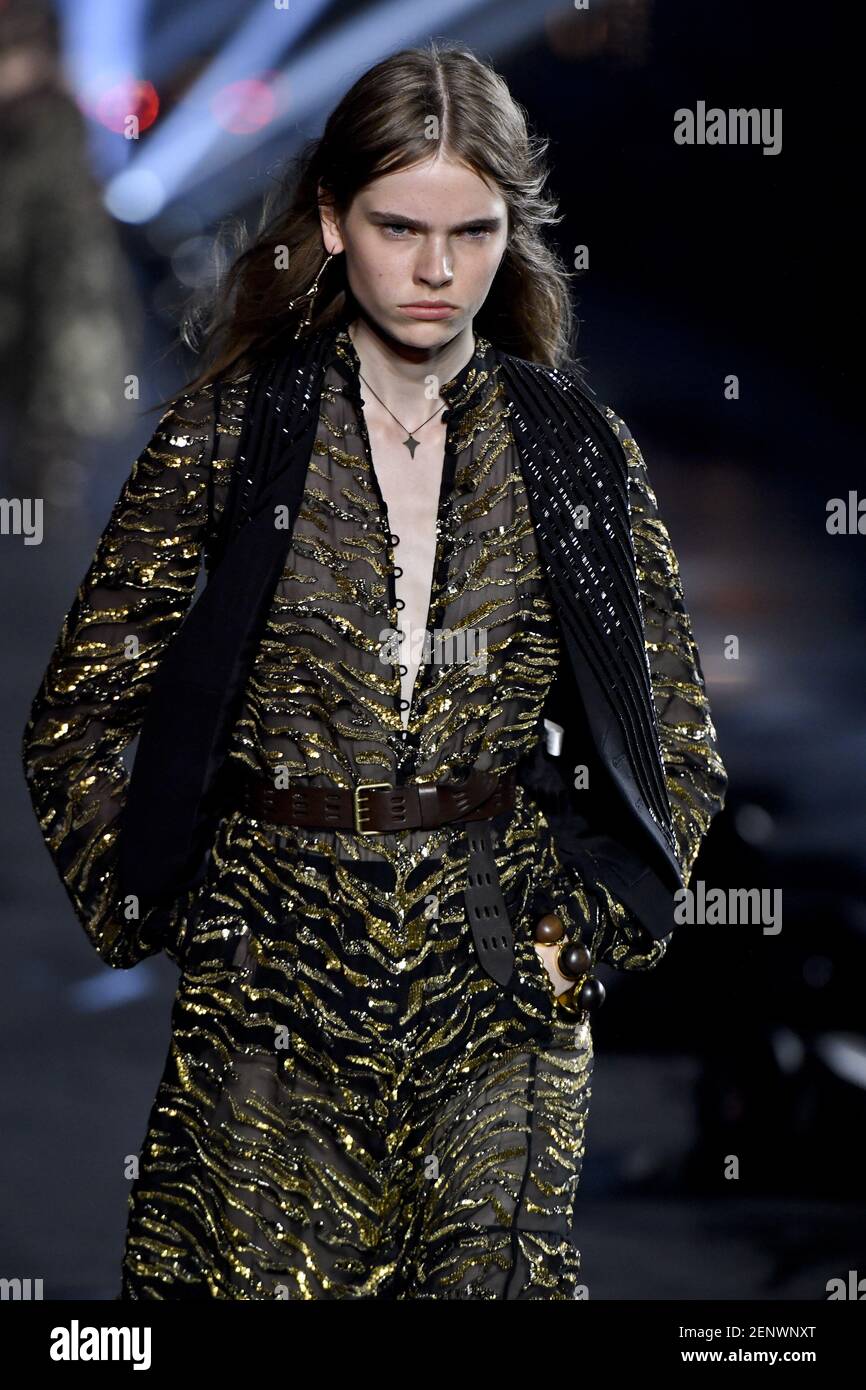Model walking on the runway during the Yves Saint Laurent Ready to Wear ...