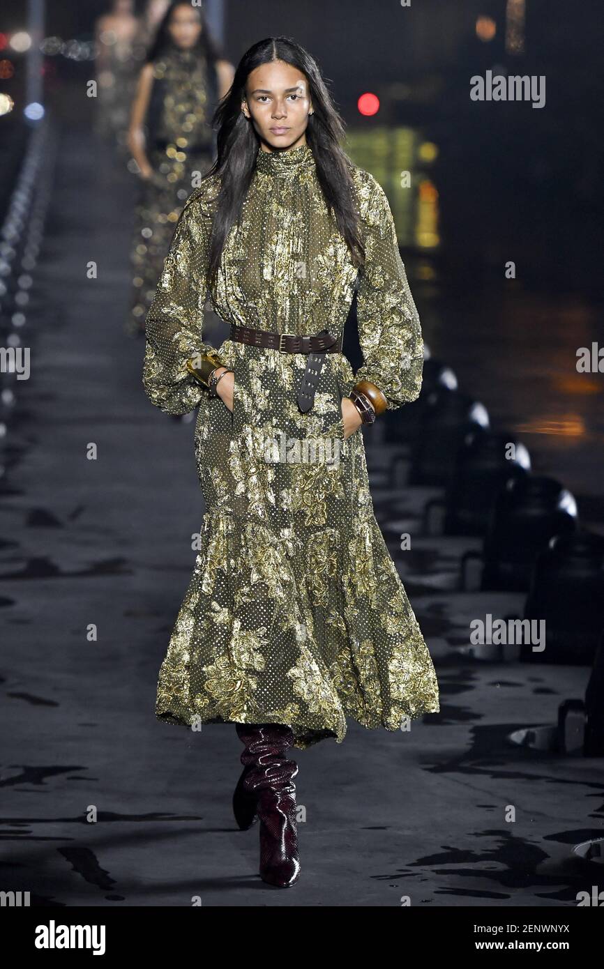 Model walking on the runway during the Yves Saint Laurent Ready to Wear ...