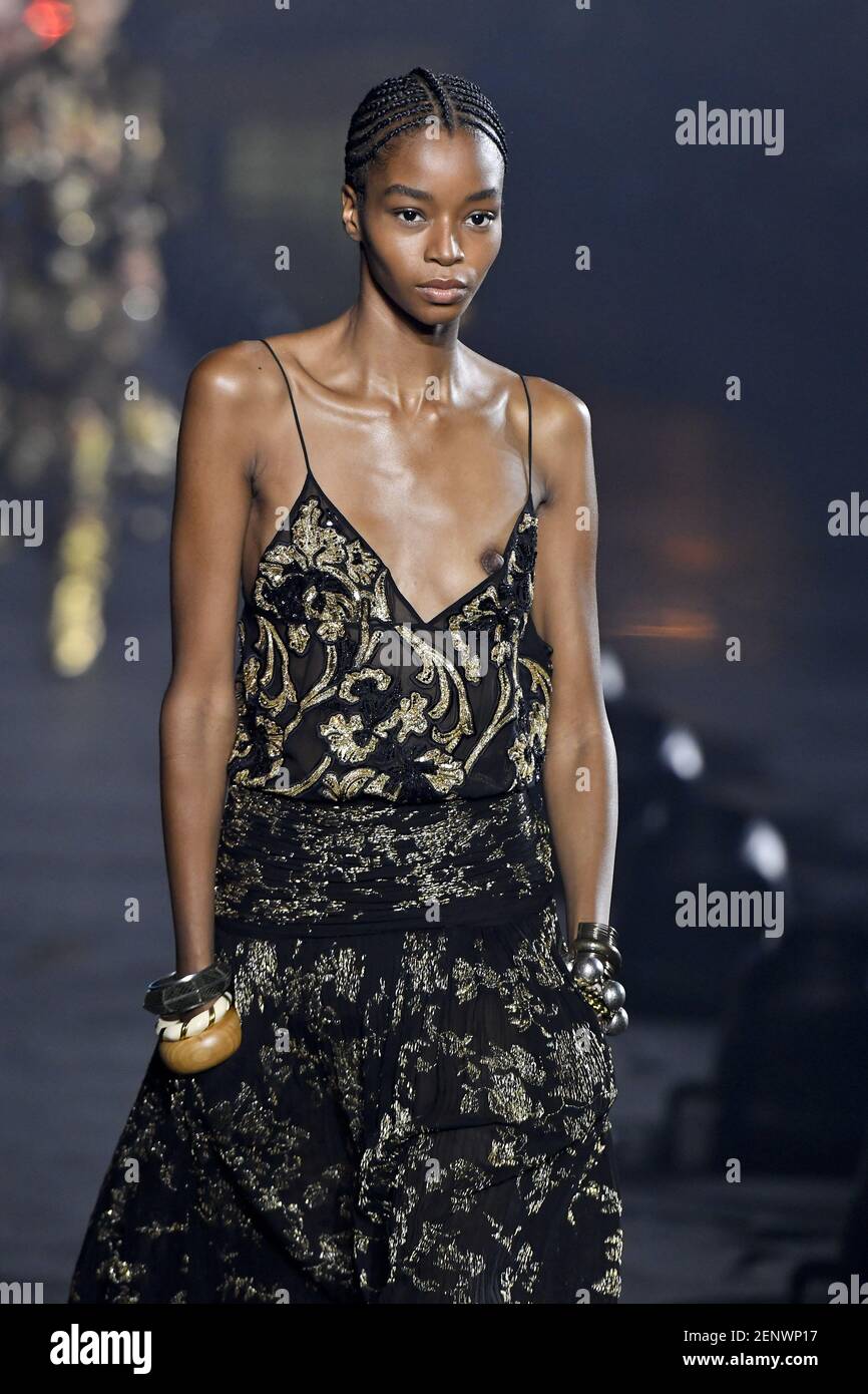 Model walking on the runway during the Yves Saint Laurent Ready to Wear ...
