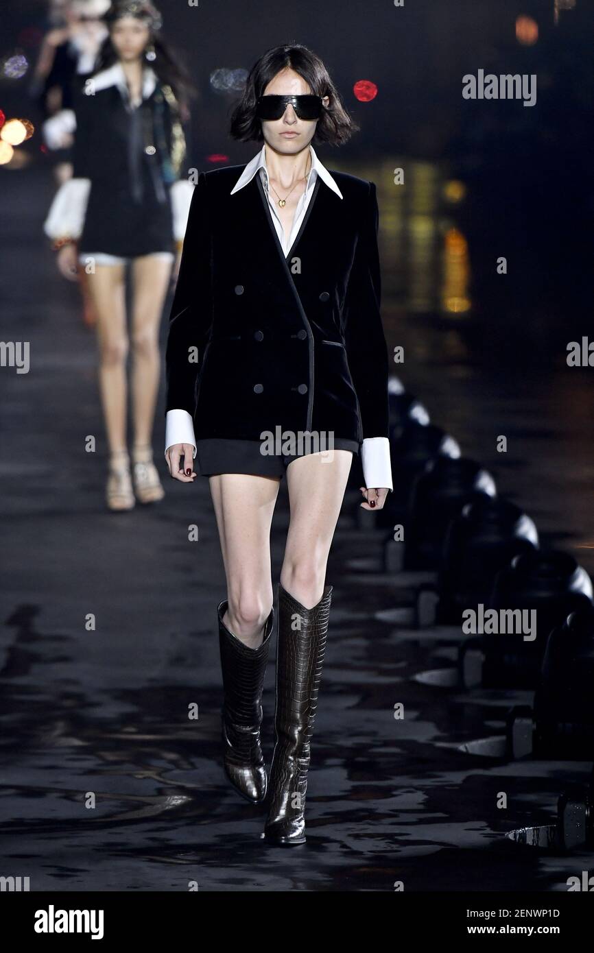 Model walking on the runway during the Yves Saint Laurent Ready to Wear ...