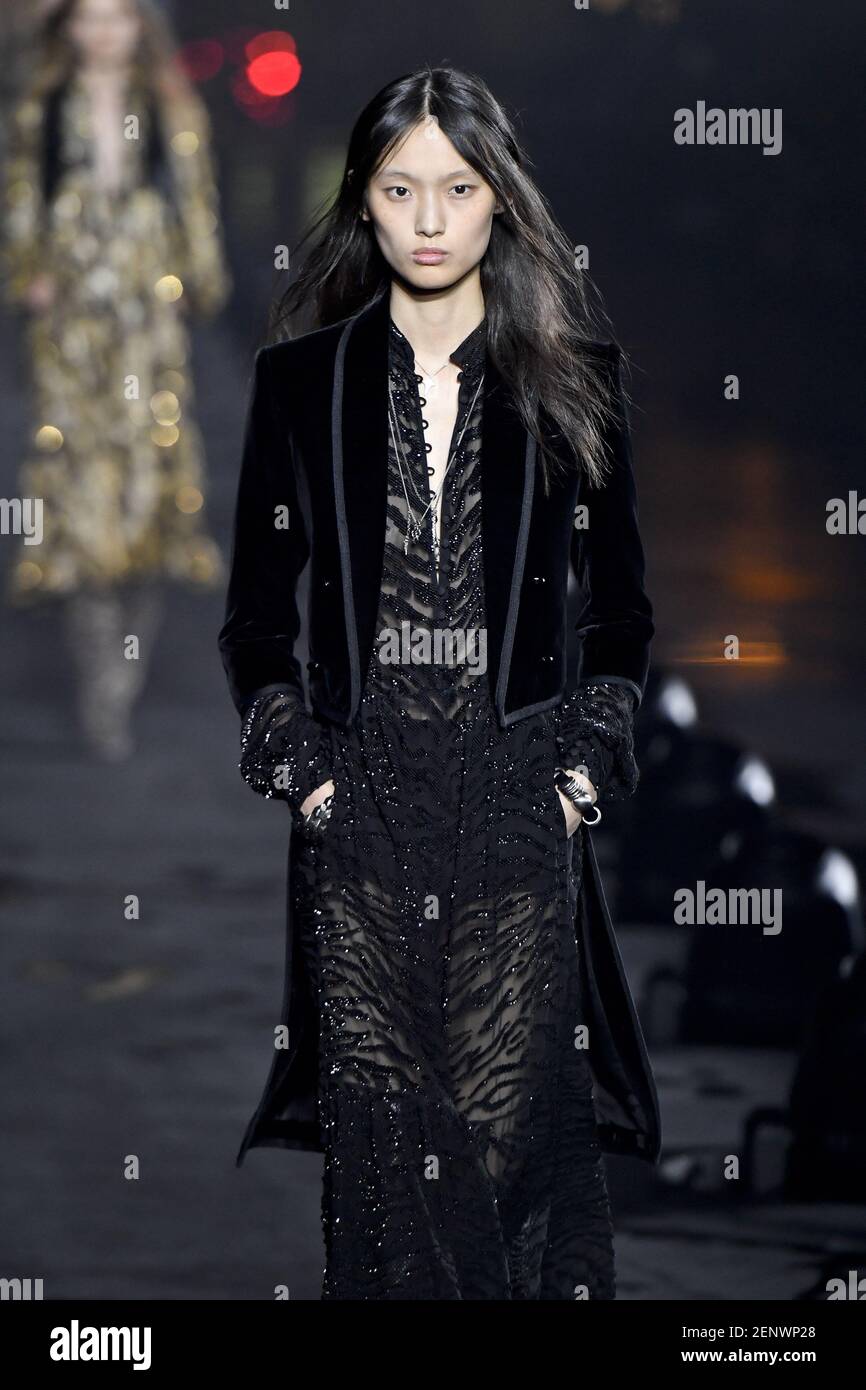 Model walking on the runway during the Yves Saint Laurent Ready to Wear ...