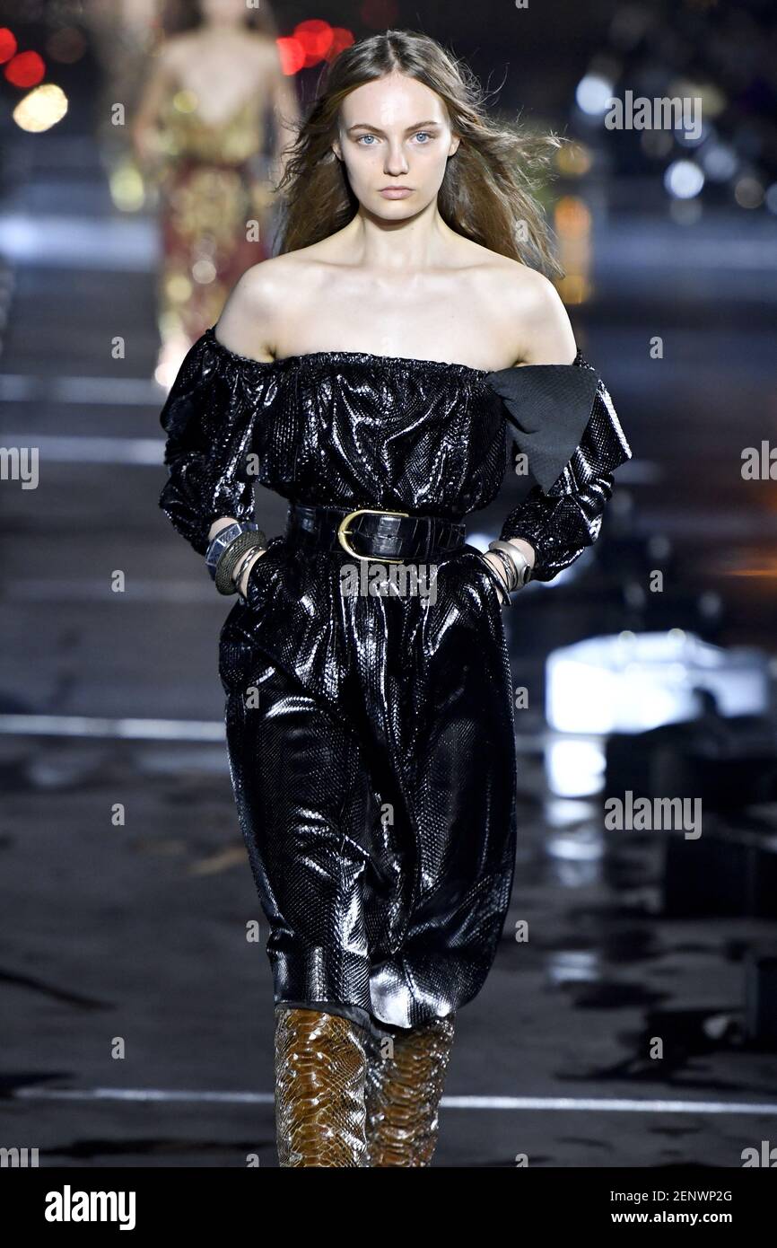 Model Fran Summers walking on the runway during the Yves Saint Laurent ...