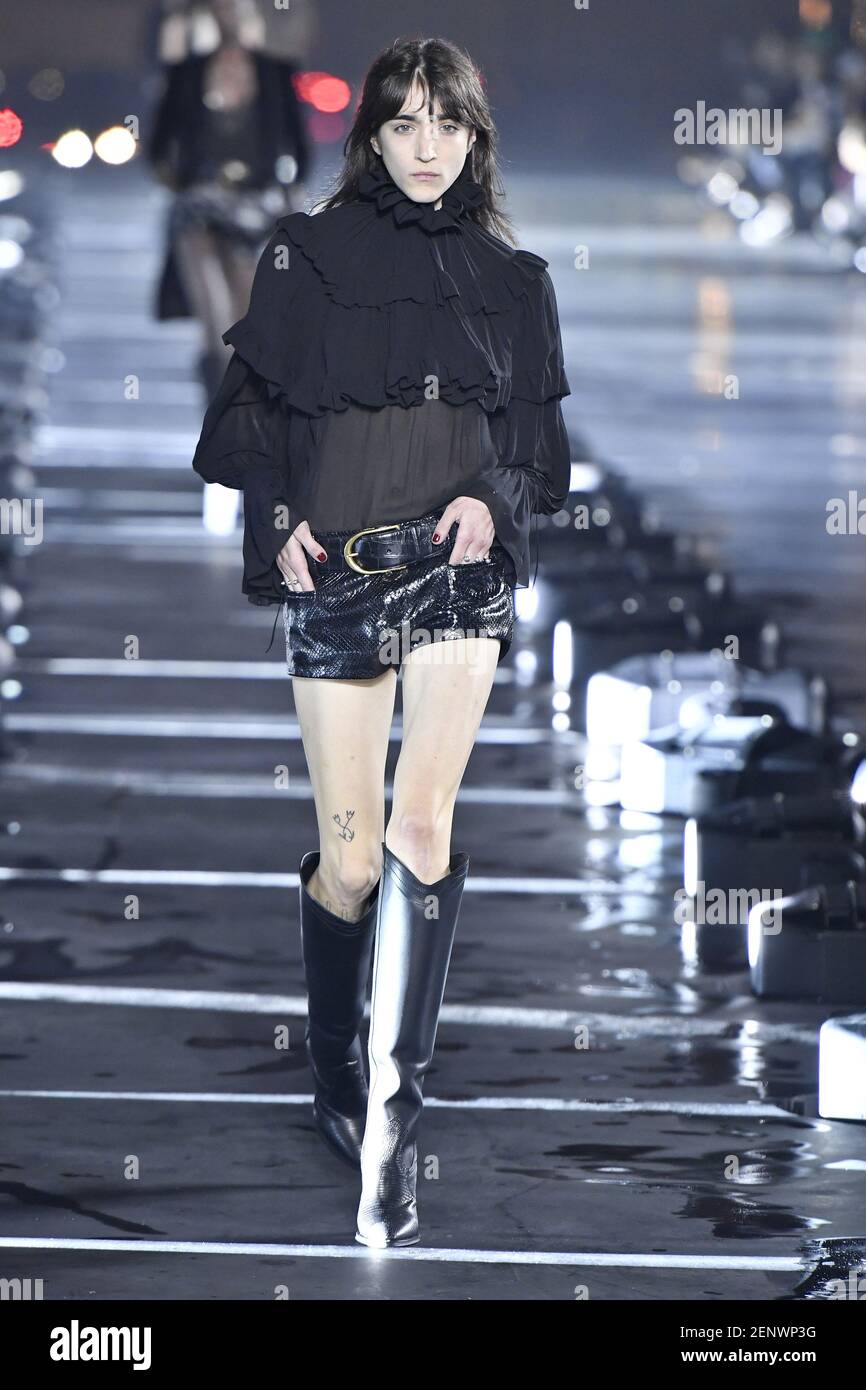 Model walking on the runway during the Yves Saint Laurent Ready to Wear ...