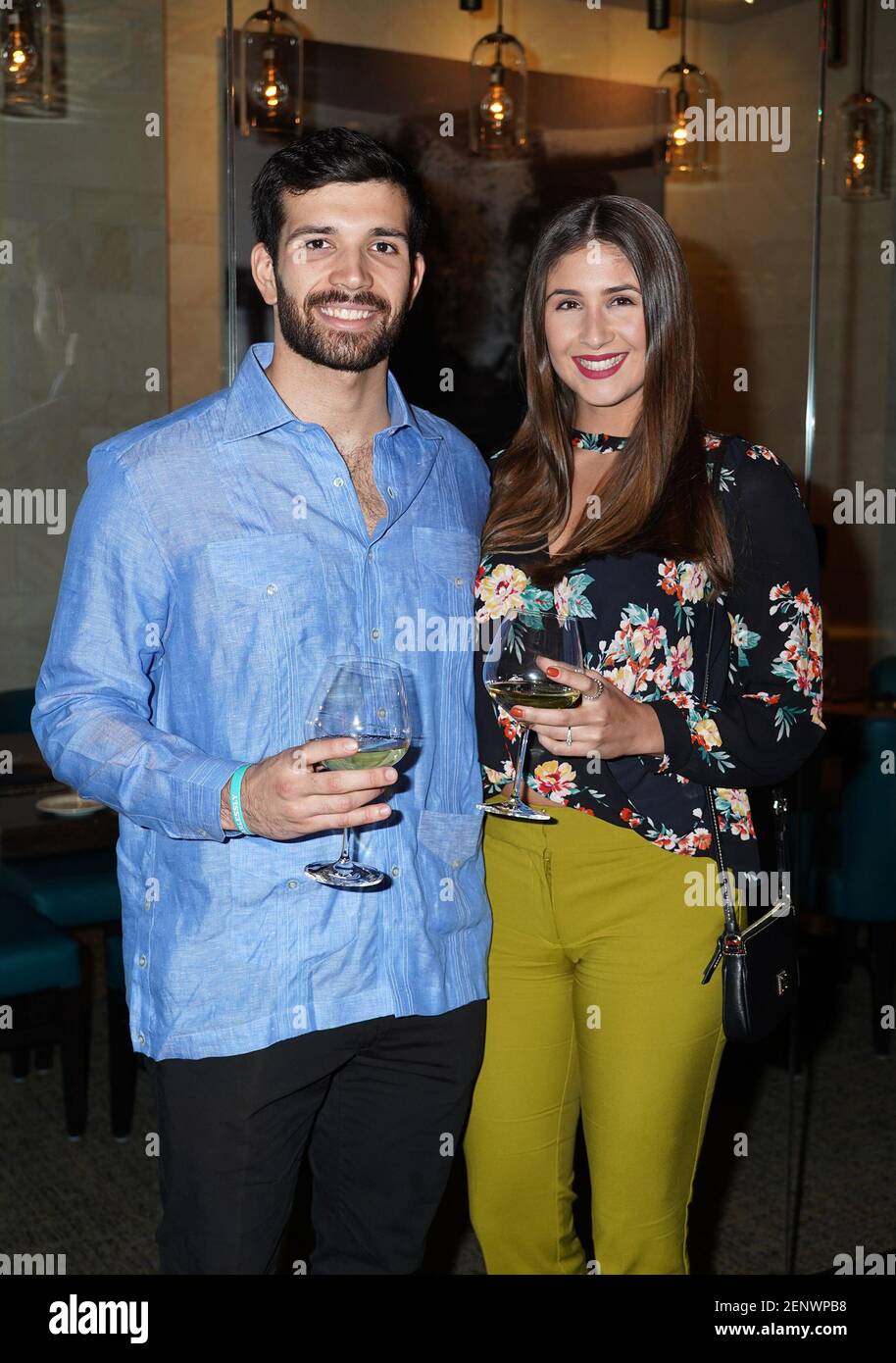 CORAL GABLES, FL - SEPT 24: Michael Bulnes and Michelle Bulnes are seen ...
