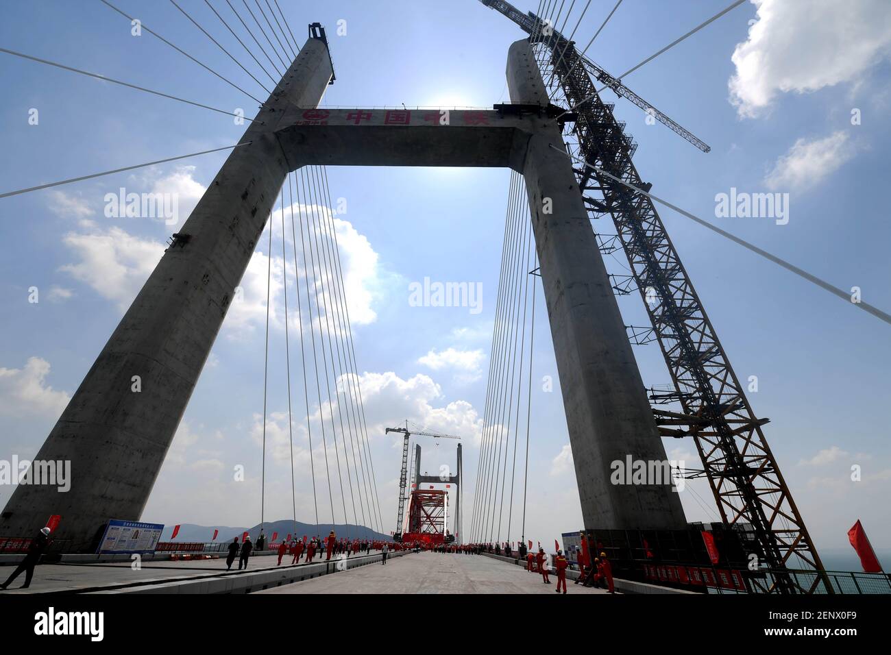 Chinese workers labor at the Pingtan Strait Road-rail Bridge, the world ...