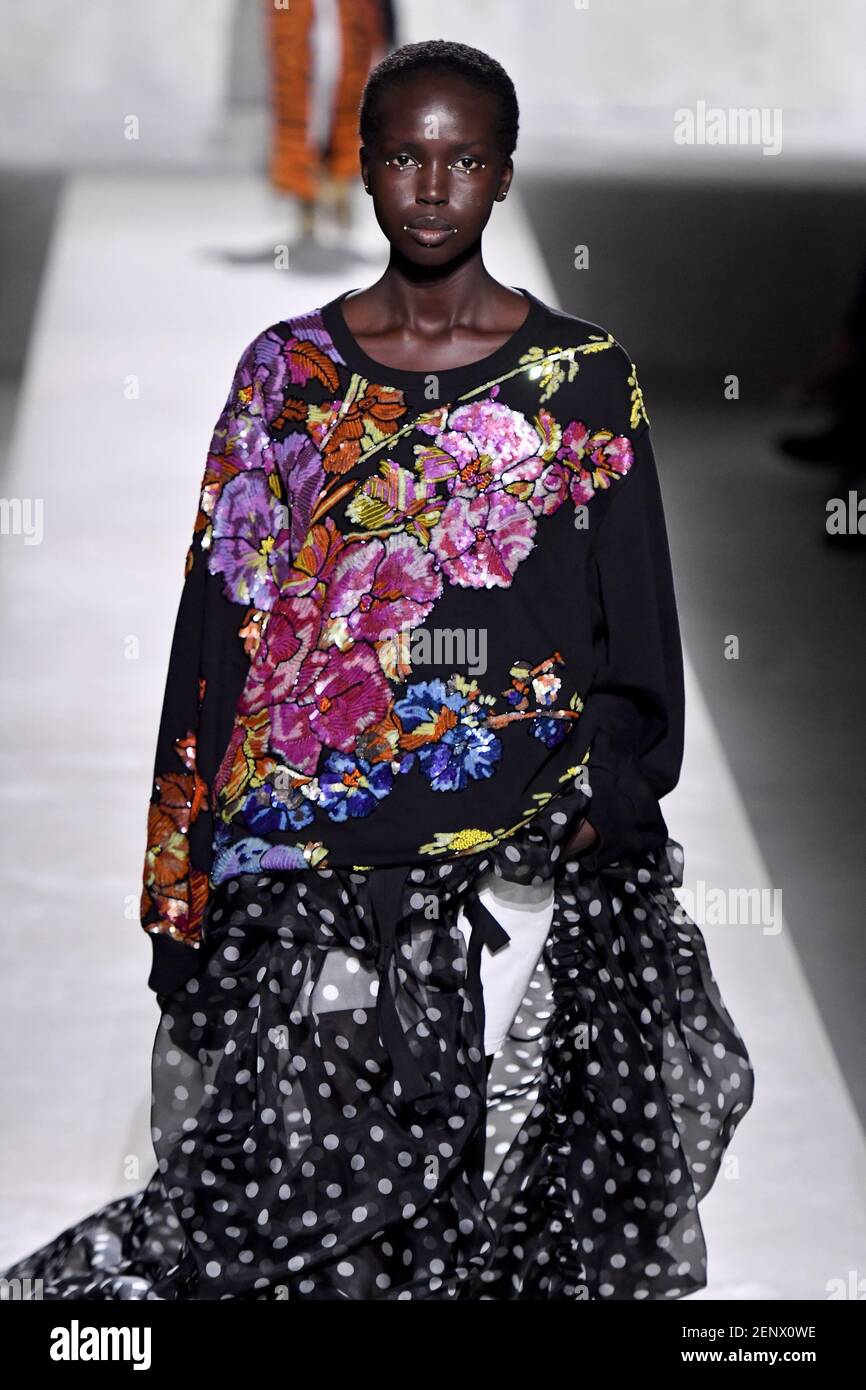 Model Ajok walking on the runway during the Dries van Noten Ready to ...