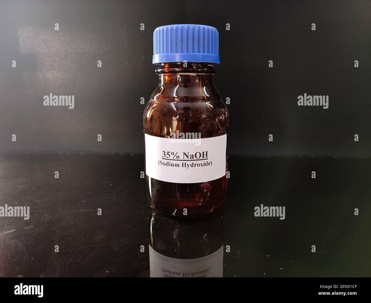 brown bottle filled with reagent solution Stock Photo - Alamy