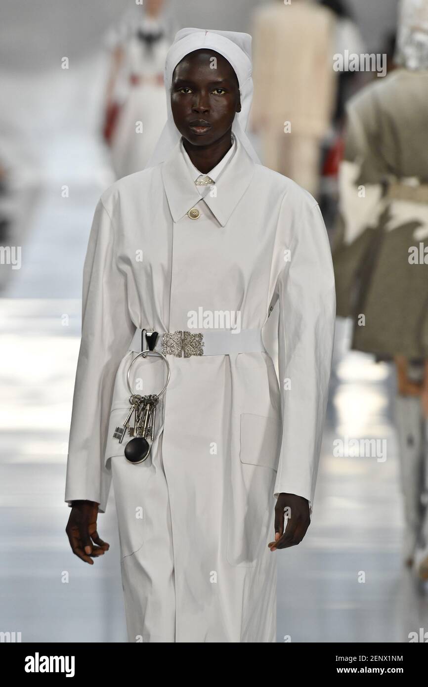 Model Ajok walking on the runway during the Maison Margiela Ready to ...