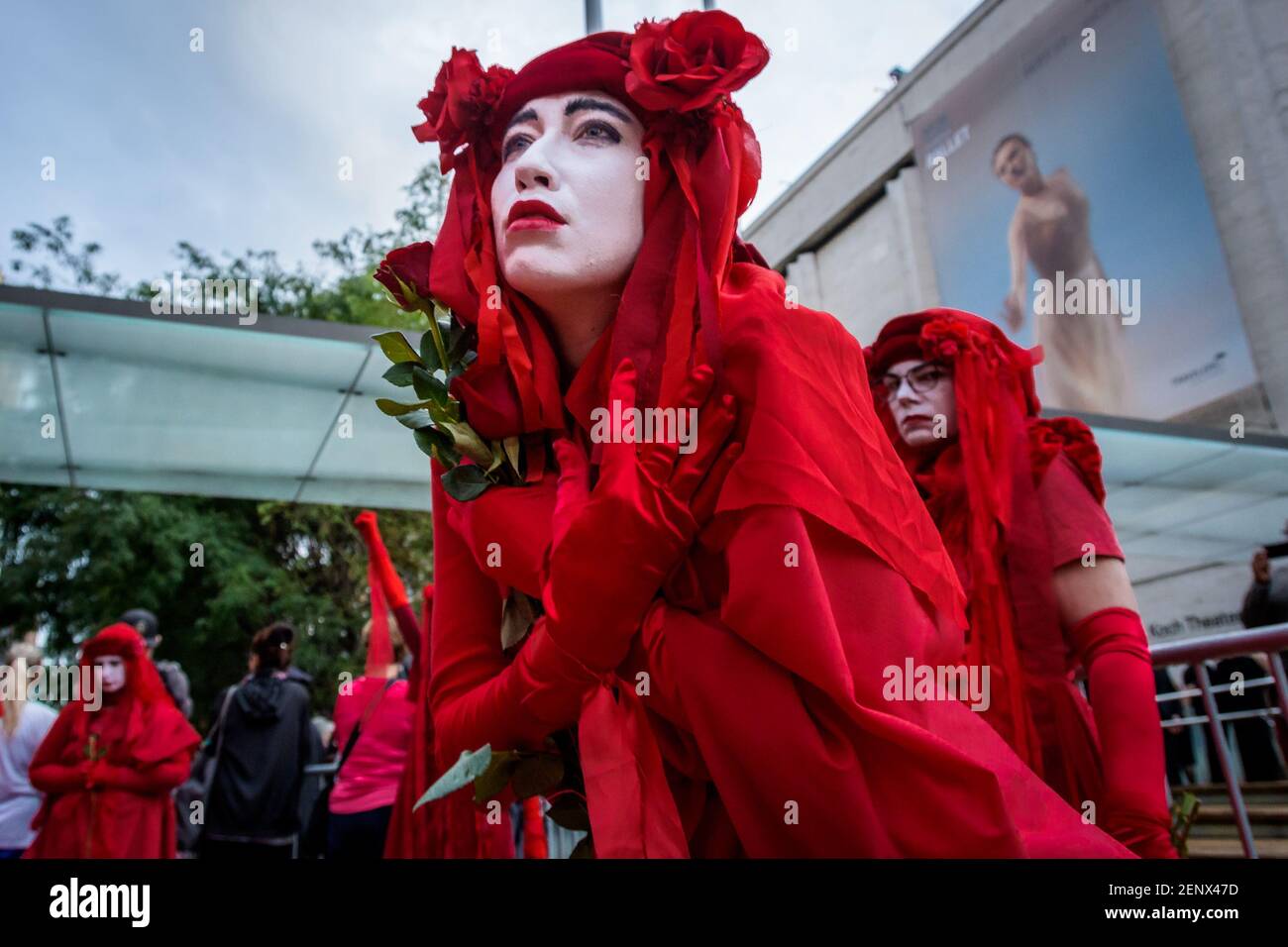 Members of the XR Red Rebel Brigade, a breakout Extinction Rebellion’s ...