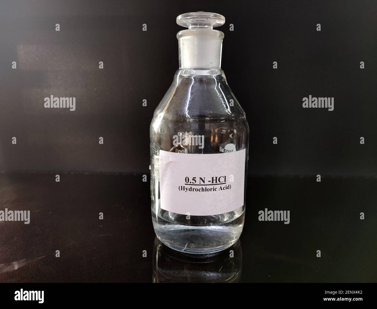 transparent bottle filled with reagent solution Stock Photo - Alamy