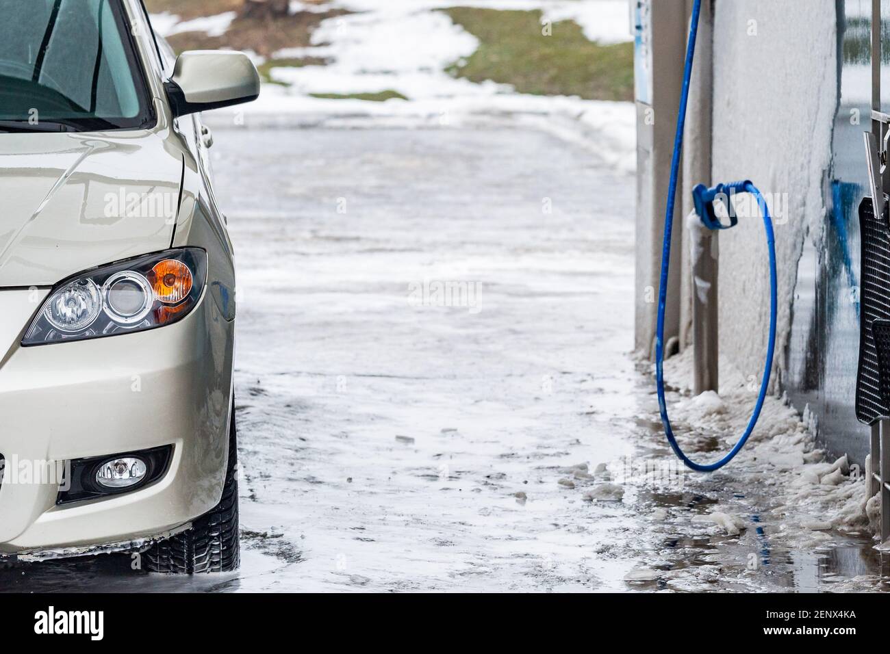 Cleaning the car with foam,car wash shop. car wash with water and foam ...
