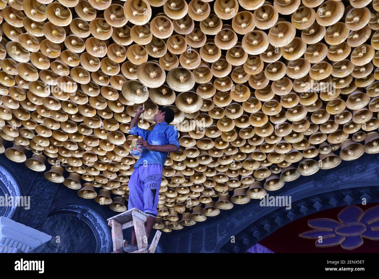 Indian artists work for makeshift pandal for the Durga Puja festival in ...
