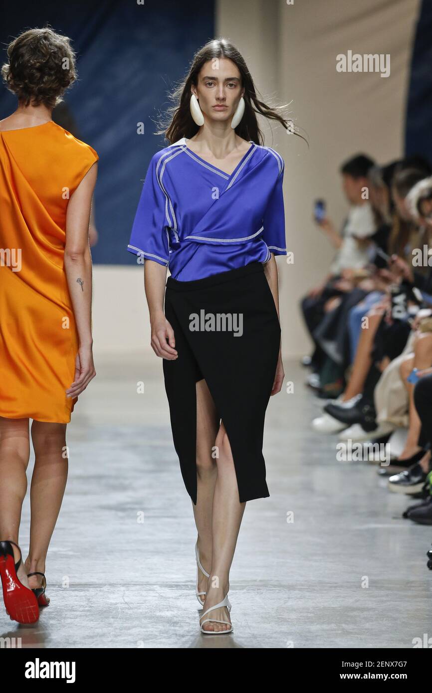 Model Amanda Googe walking on the runway during the Atlein Ready to ...