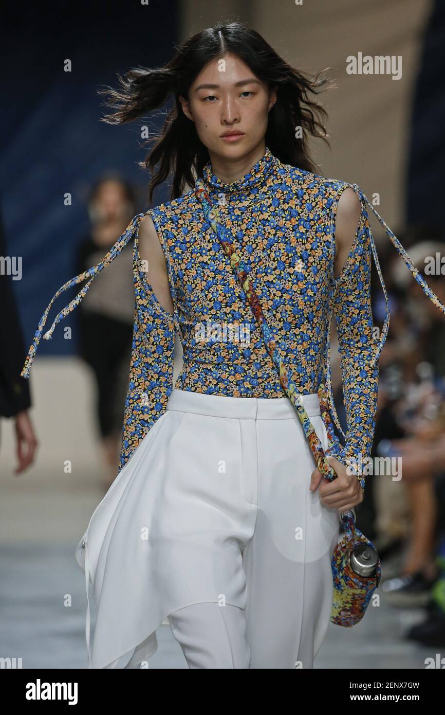 Model Chu Wong walking on the runway during the Atlein Ready to Wear ...