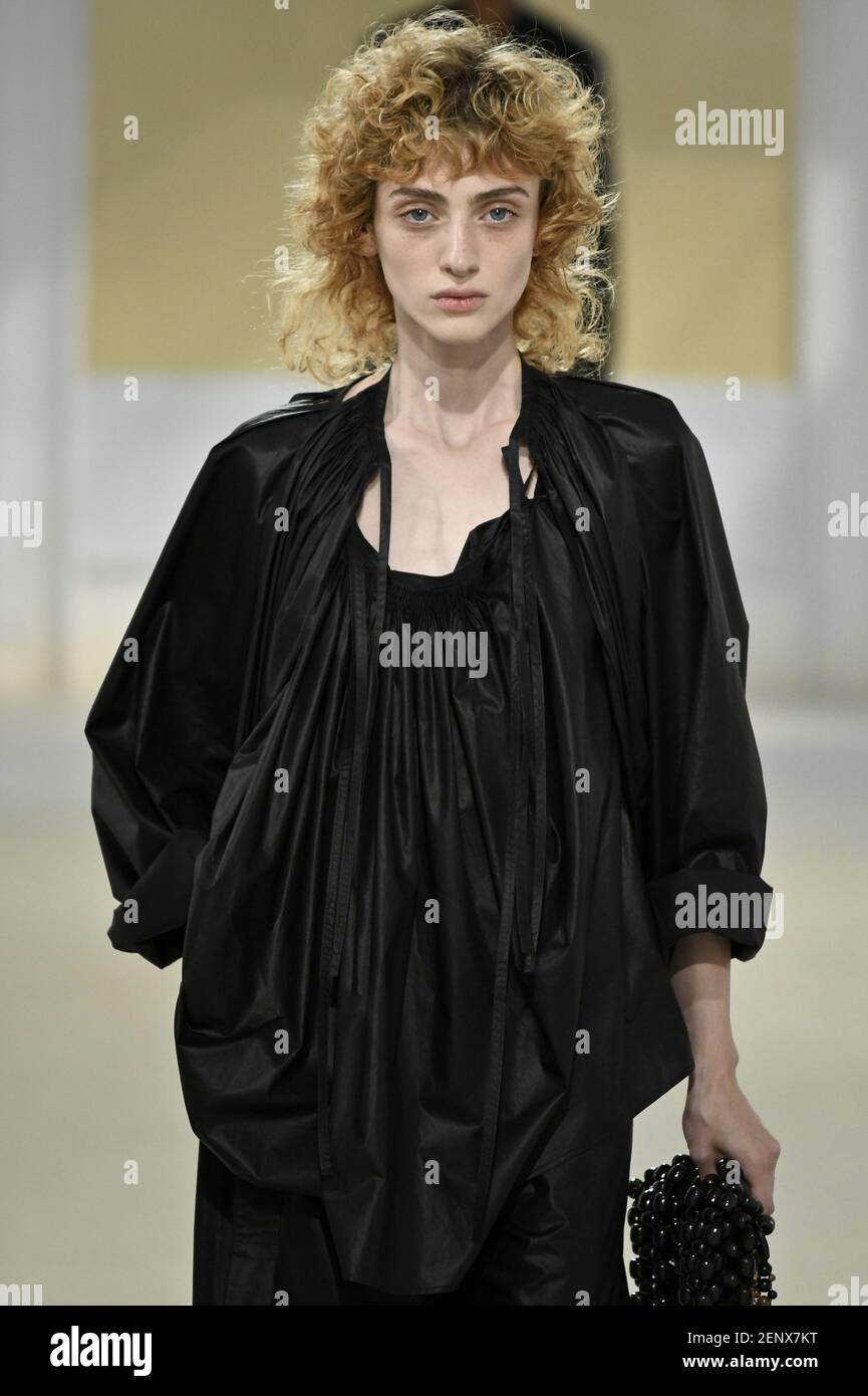 Model Lika Rigvava walking on the runway during the Christophe Lemaire ...