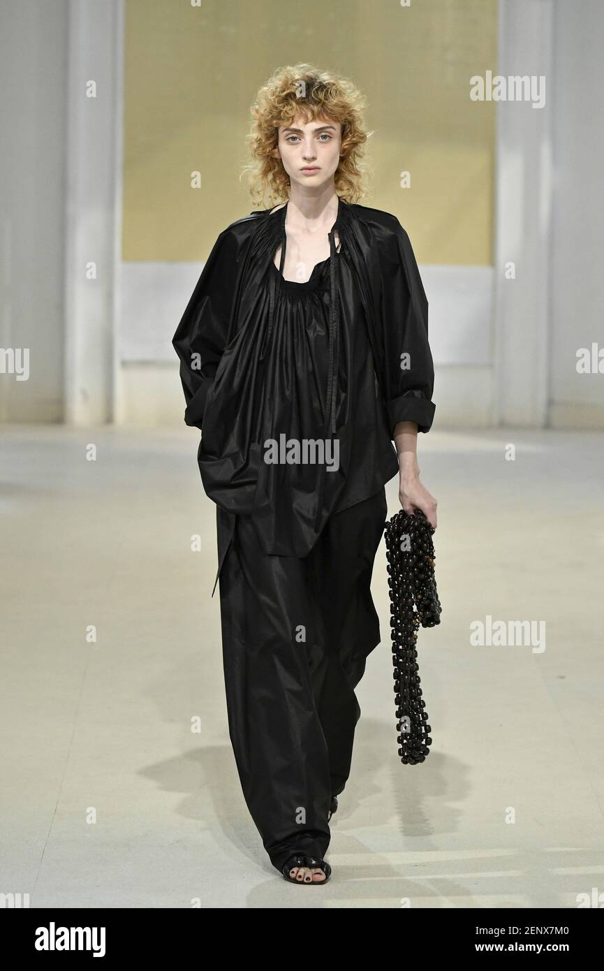 Model Lika Rigvava walking on the runway during the Christophe Lemaire ...