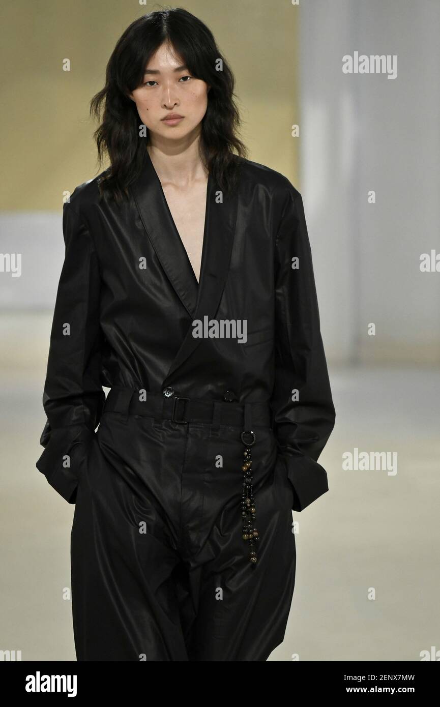 Model Chu Wong walking on the runway during the Christophe Lemaire ...