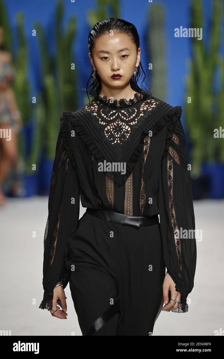 Model walking on the runway during the Ingie Ready to Wear Spring ...