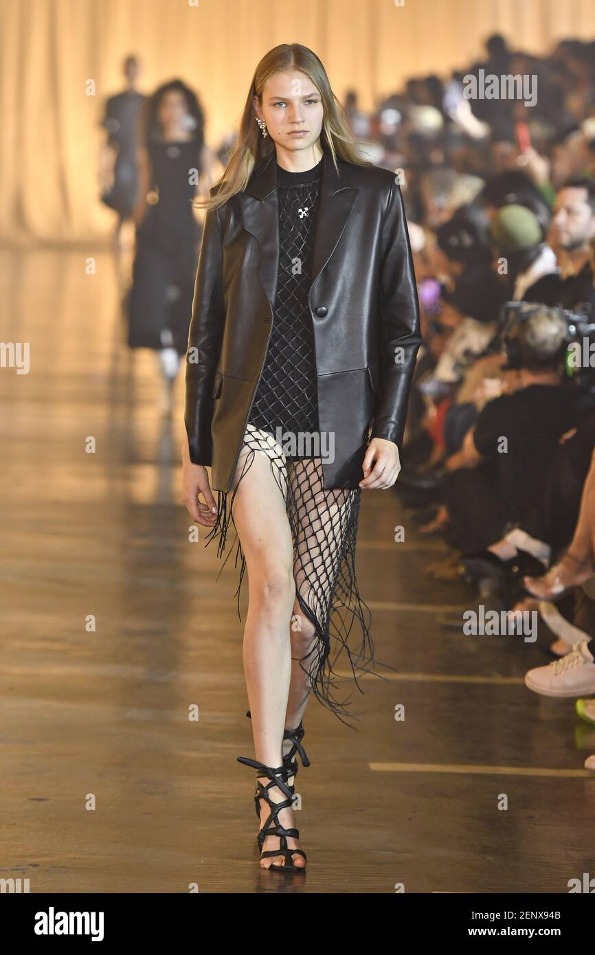 Model Deirdre Fírinne walking on the runway during the Off-White Ready ...