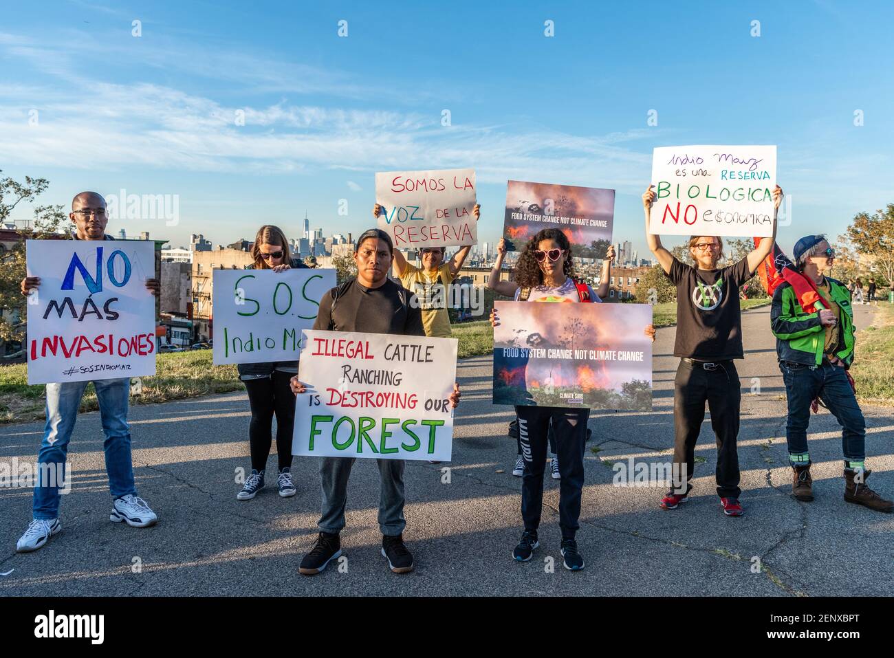 Environmental and animal rights activists holding signs at the Earth ...
