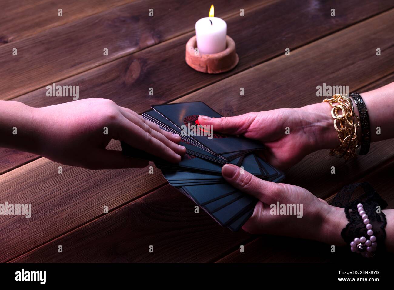 Fortune Teller S Hands With Prediction Cards On A Wooden Background The Oracle Visitor Draws A