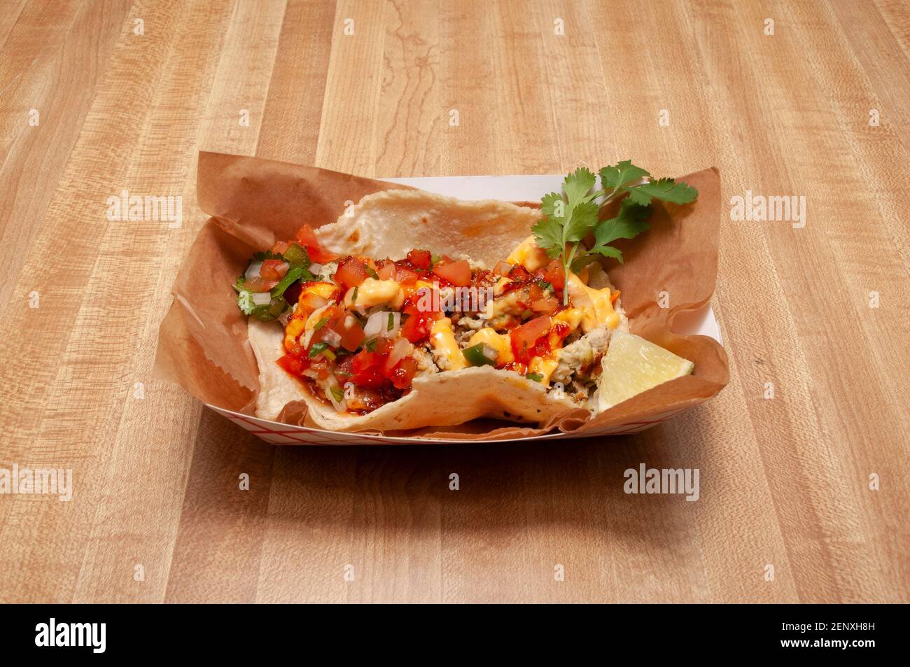 Authentic tex mex mexican cuisine known as a chicken Taco Stock Photo ...