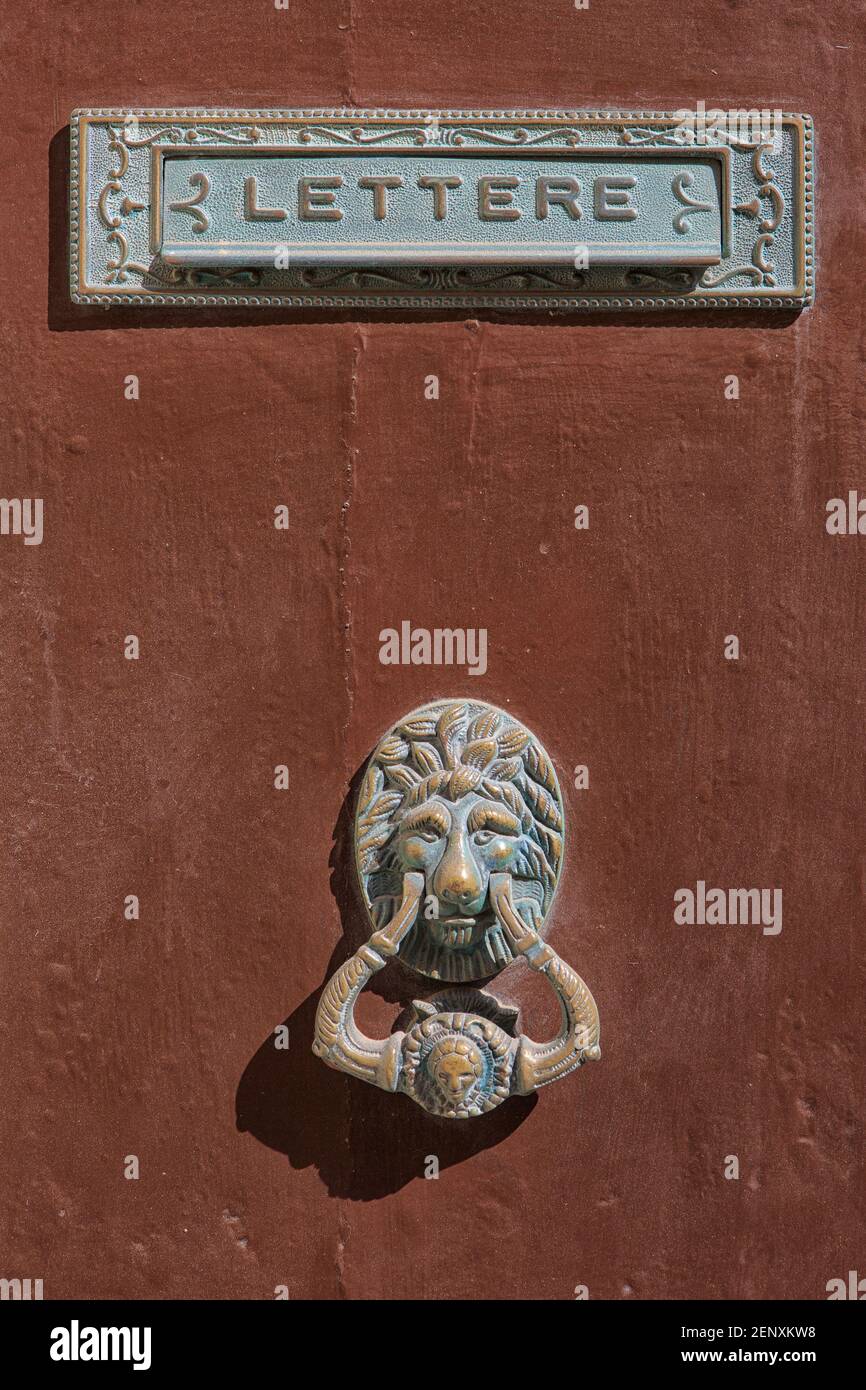 Traditional ornate Maltese lion head-shaped door knocker and letter box ...