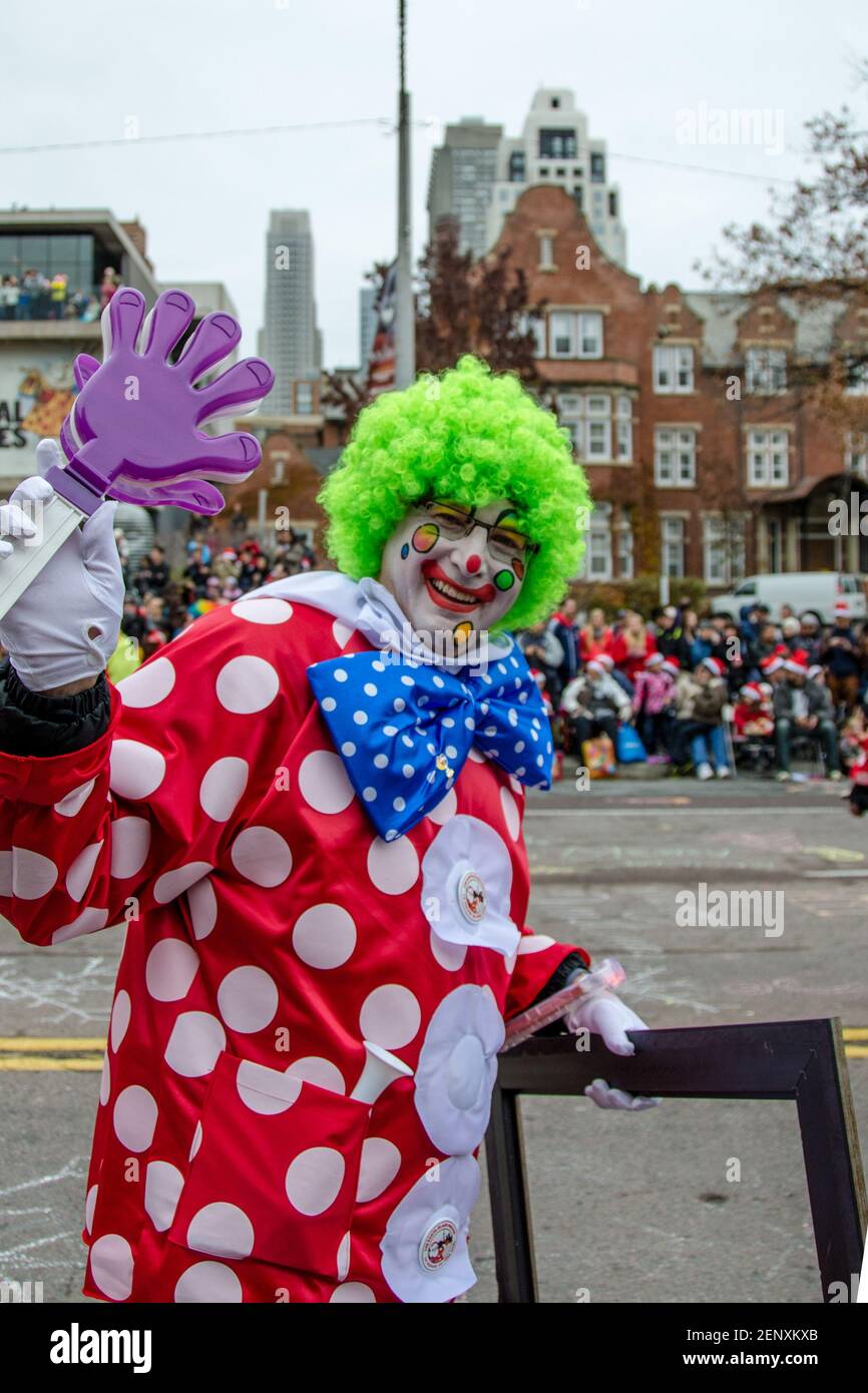 Joyful clown marching in celebration of the 109th edition of the Santa ...