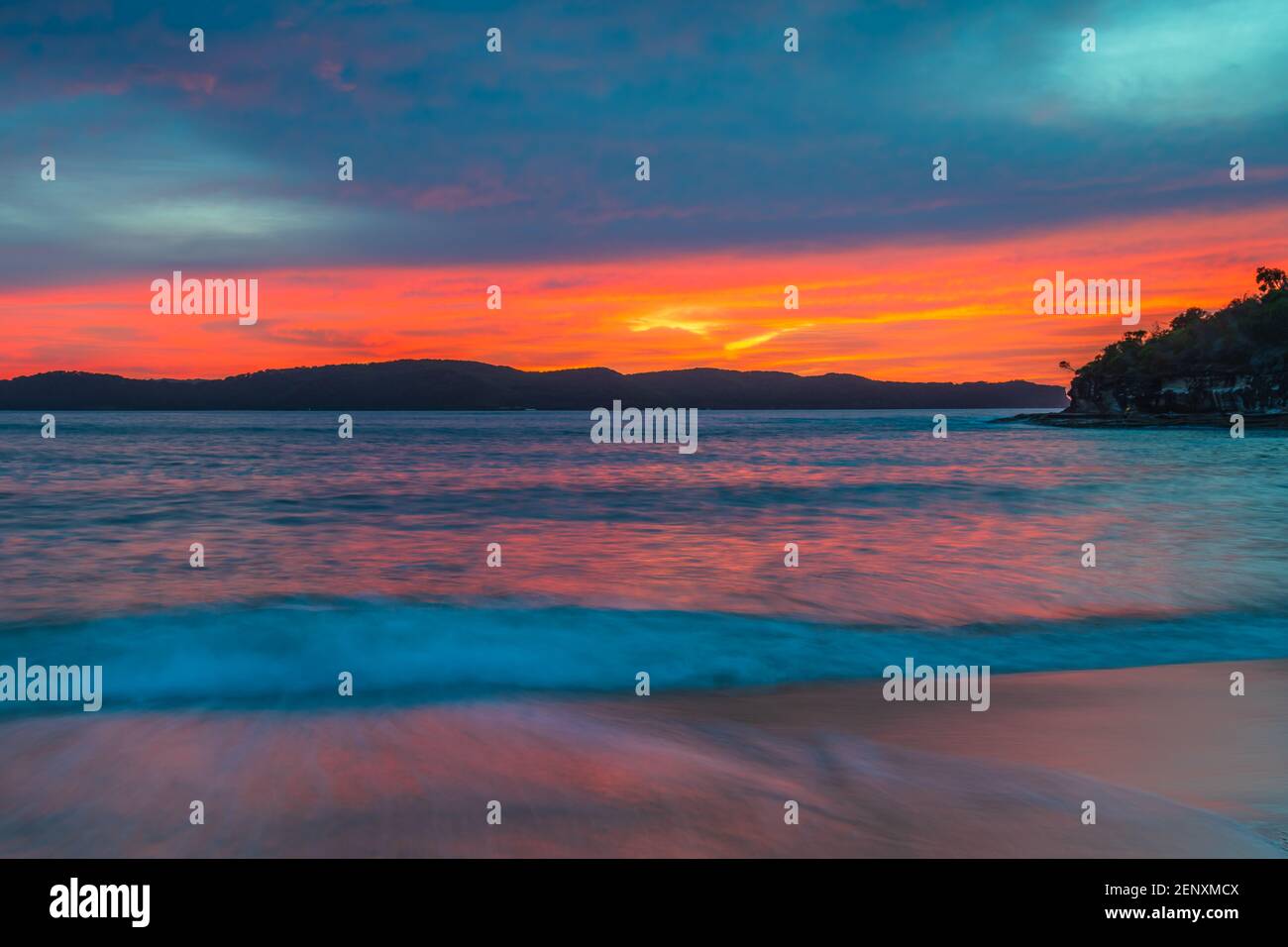 Sunrise seascape and cloud filled sky from Pearl Beach on the Central ...
