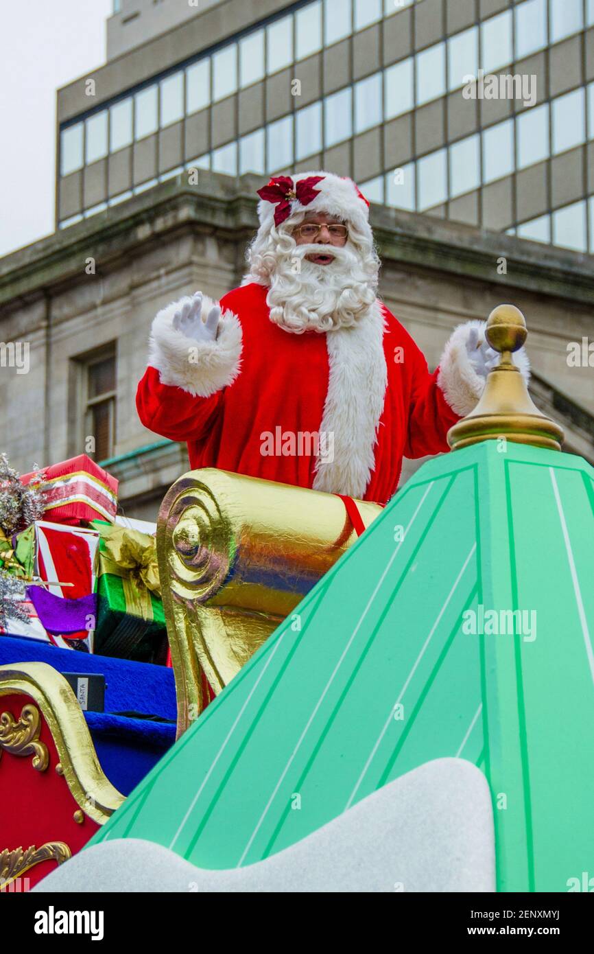 Santa Claus greeting the public from his float in celebration of the ...