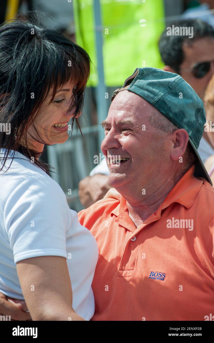 Salsa on St. Saint Clair Festival Scenes: Two laughing dancers are a ...