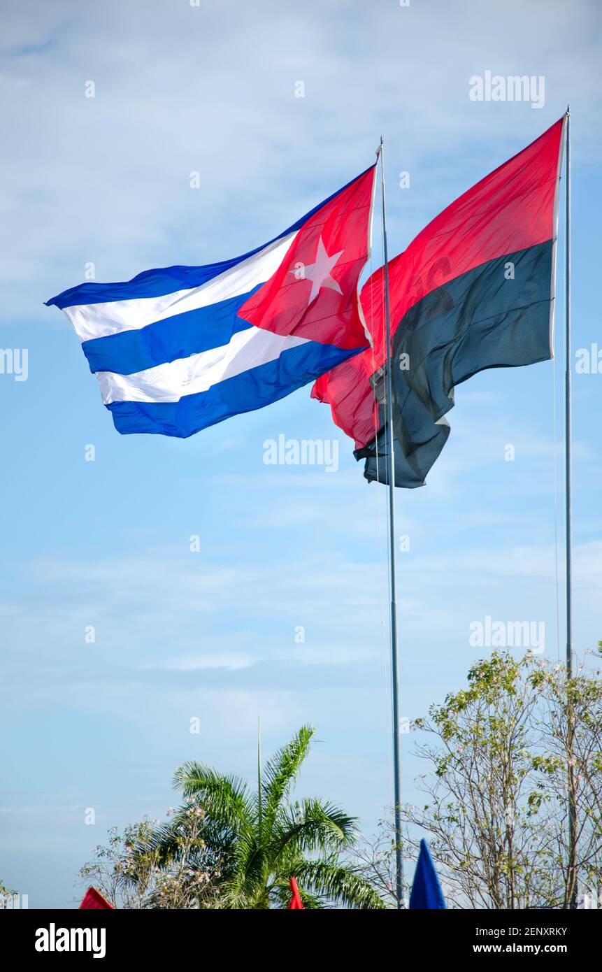Photo of the two main Cuban flags displayed at political events in the ...