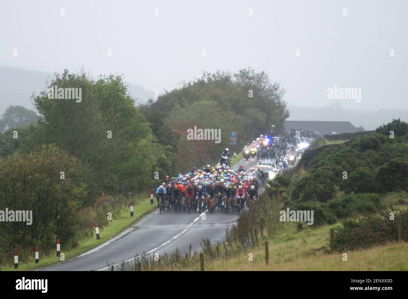 Peloton riding in heavy rain, Elite Men’s Road Race, Harrogate ...