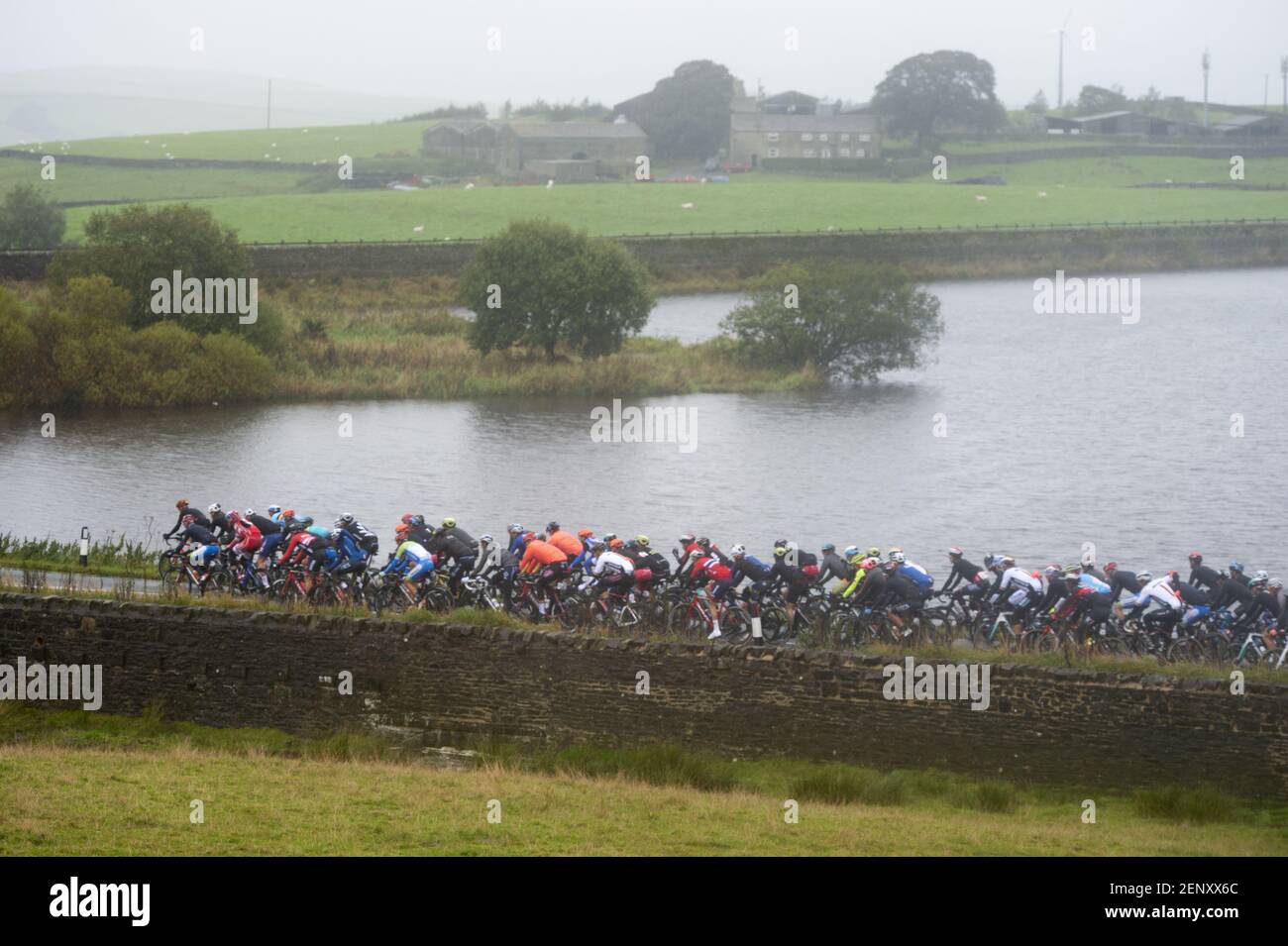 Peloton riding in heavy rain, Elite Men’s Road Race, Harrogate ...