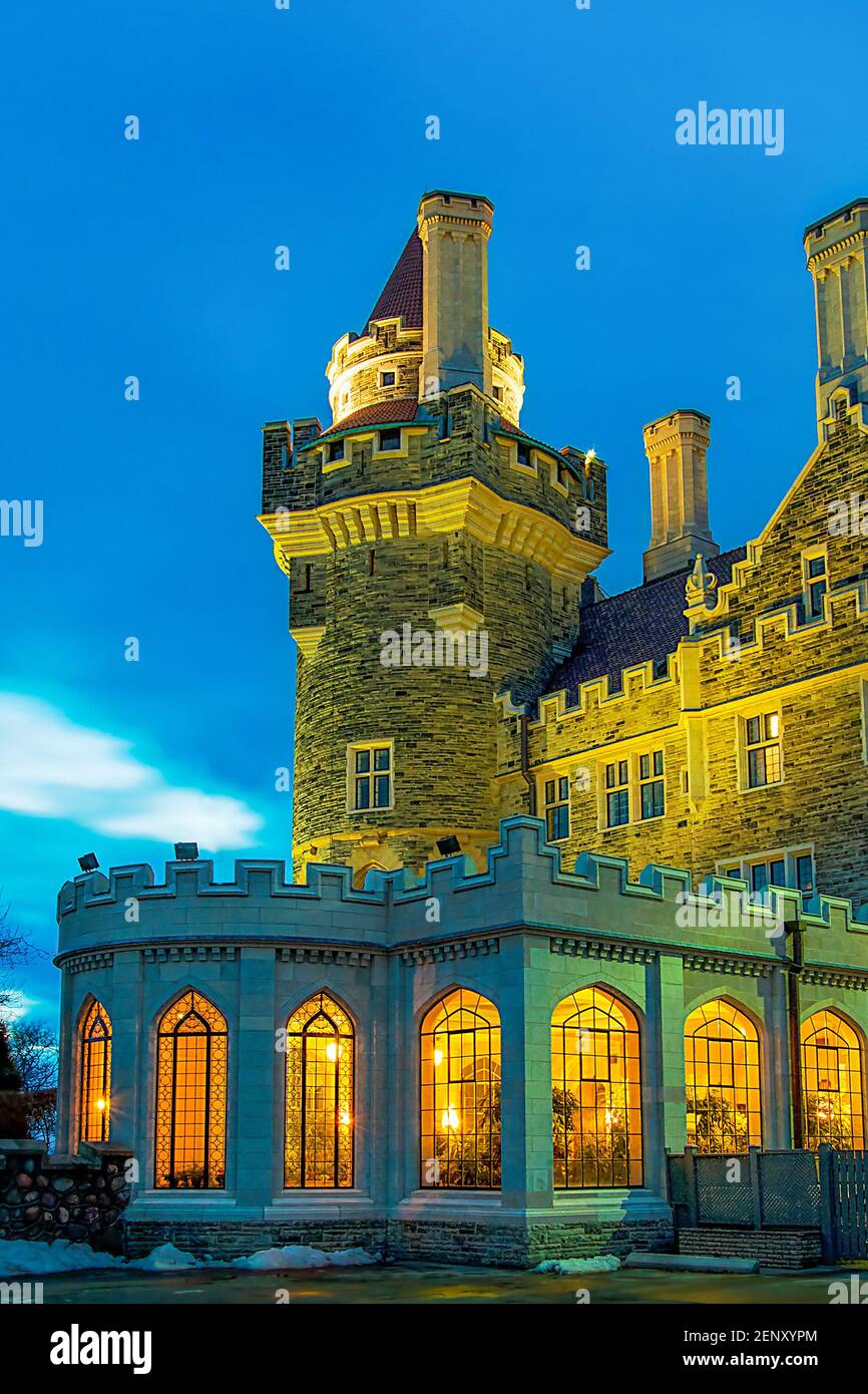 Old beautiful castle with large windows and night-lighting Stock Photo ...