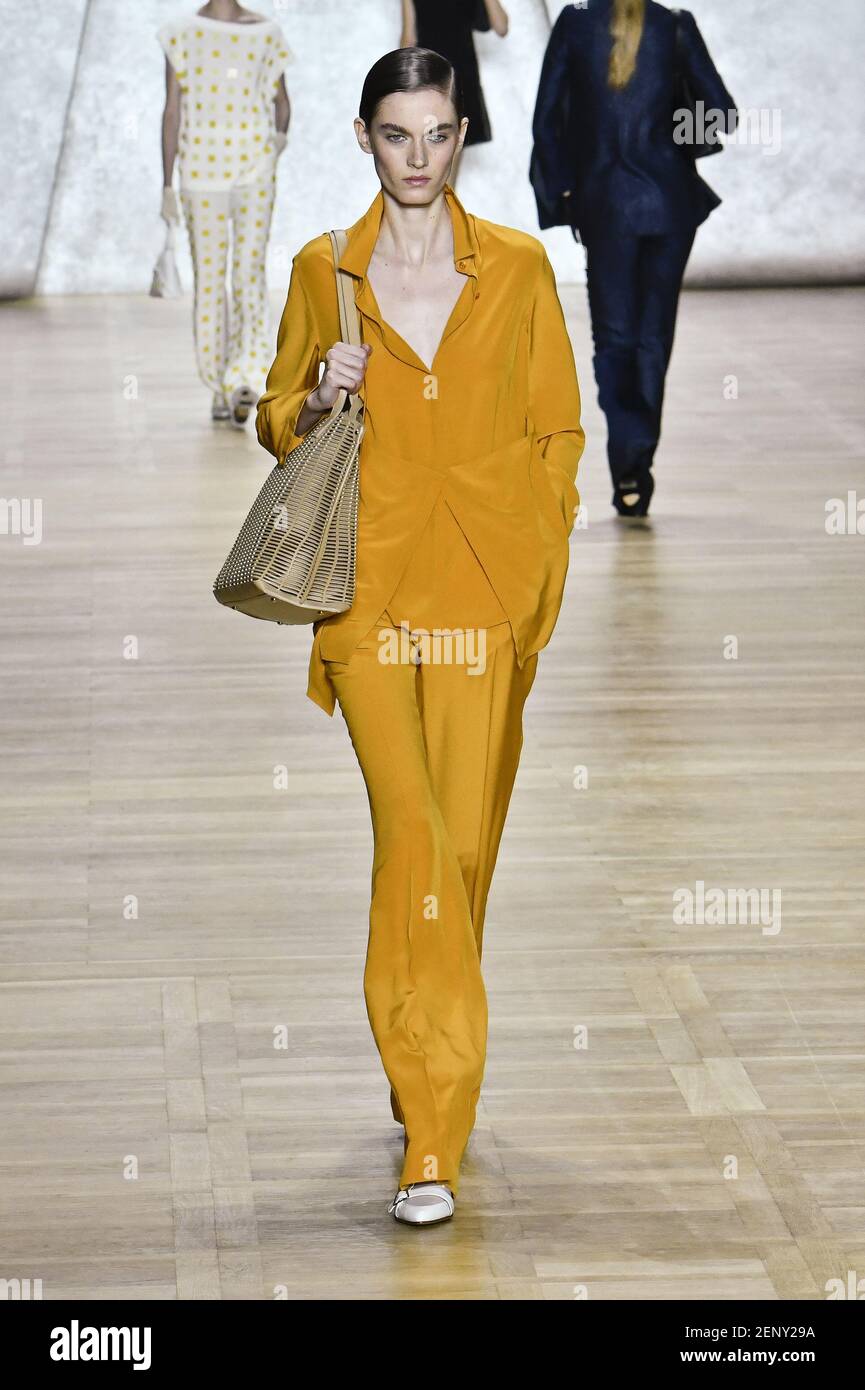 Model walking on the runway during the Akris Ready to Wear Spring ...