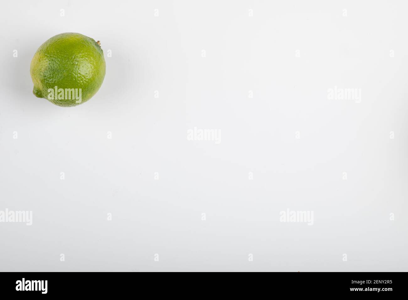 Single ripe lime fruit isolated on white background Stock Photo - Alamy